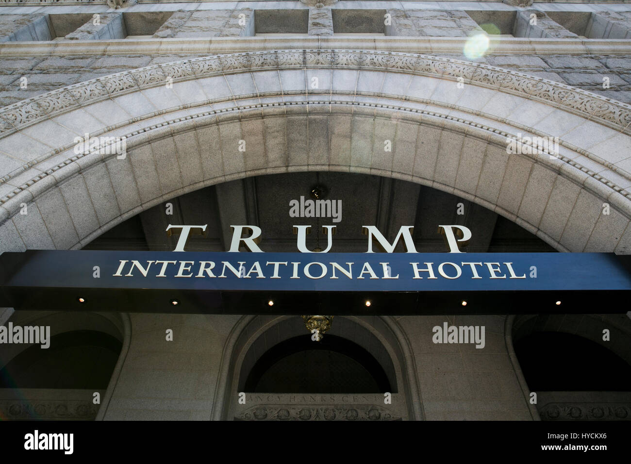 A logo sign outside of the Trump International Hotel in the Old Post ...
