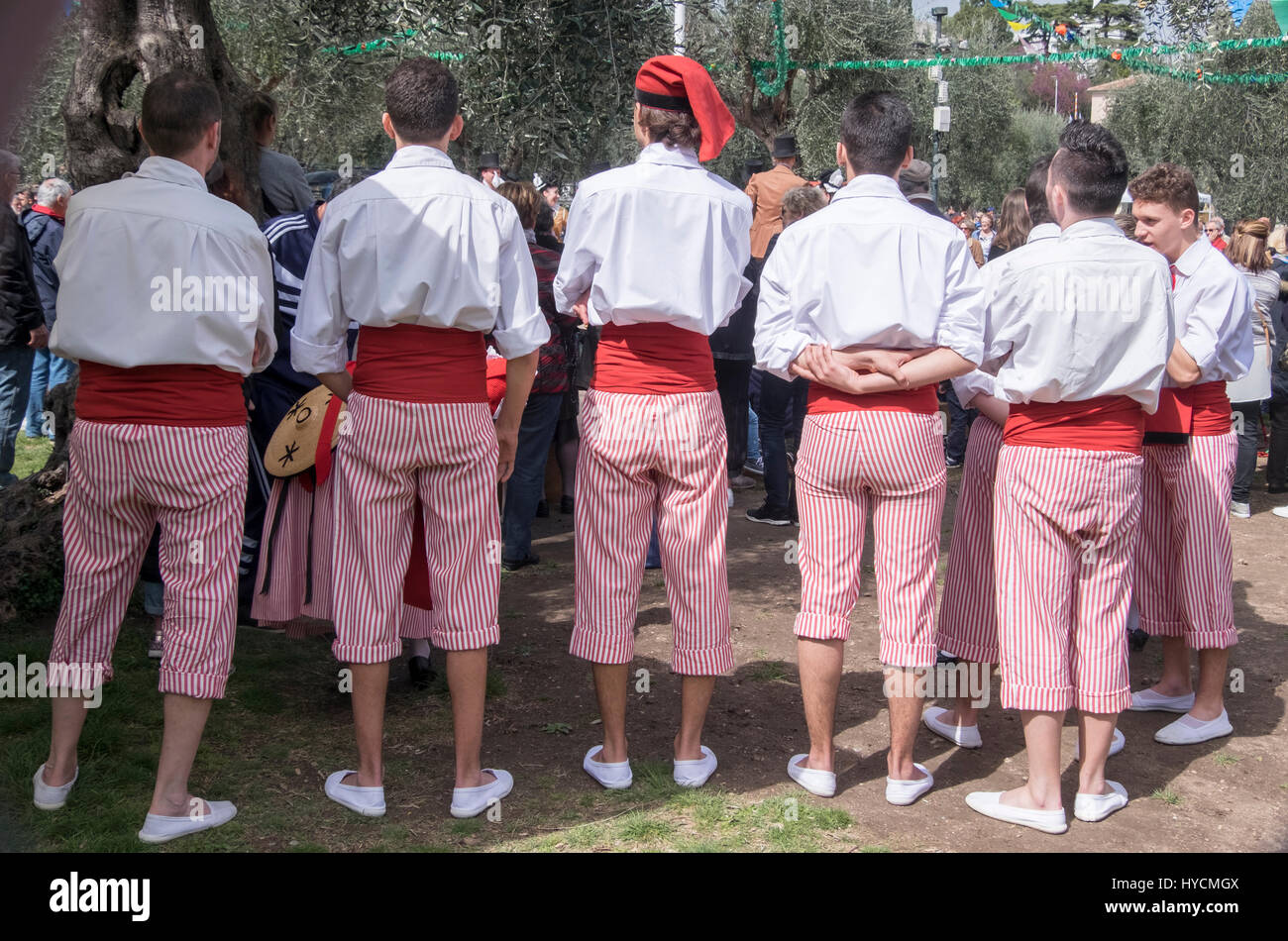 Male folk dancers of Nice, France waiting to perform a traditional folk ...