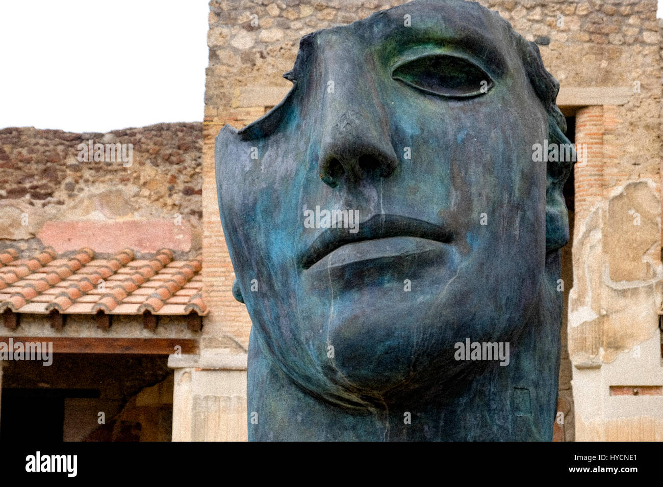 Modern bronze abstract sculpture of a Roman man on the ancient Roman ...