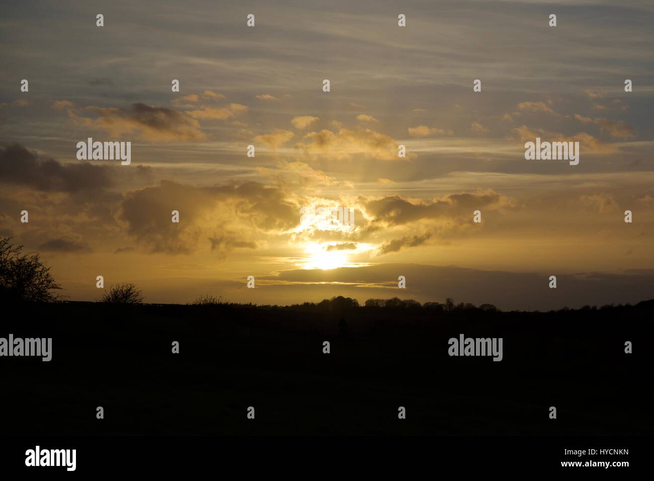A sunset over the English countryside Stock Photo - Alamy