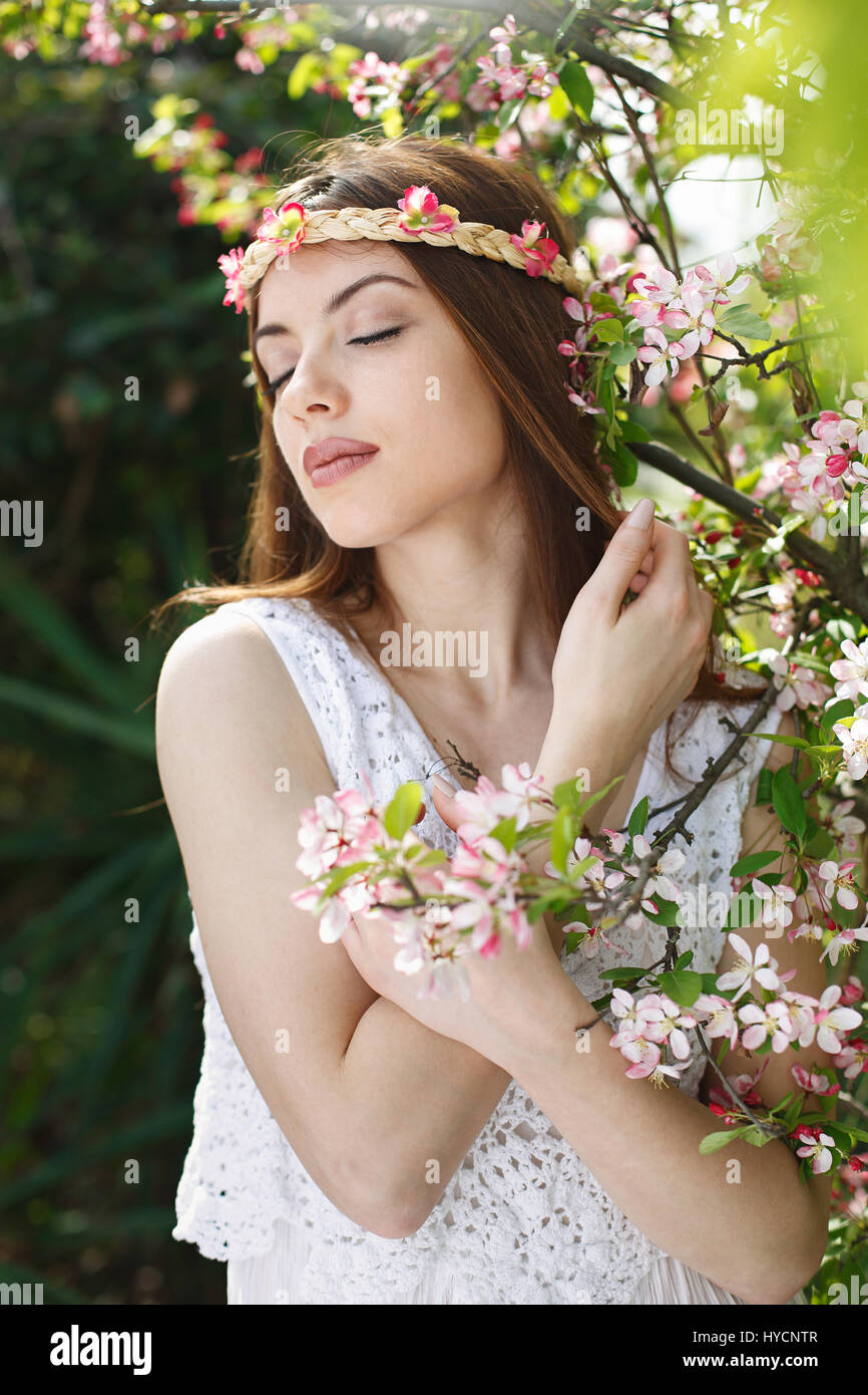 Woman enjoying spring beauty and purity Stock Photo - Alamy