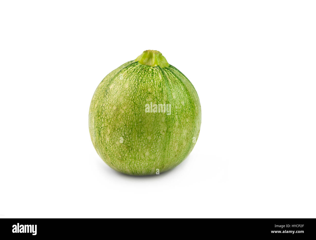 round courgettes zucchini on white background Stock Photo - Alamy