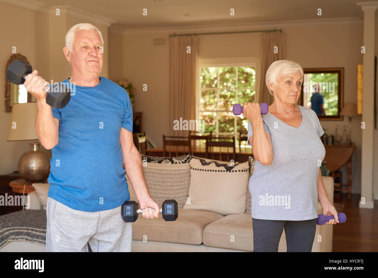Old people lifting exercise hi-res stock photography and images - Alamy