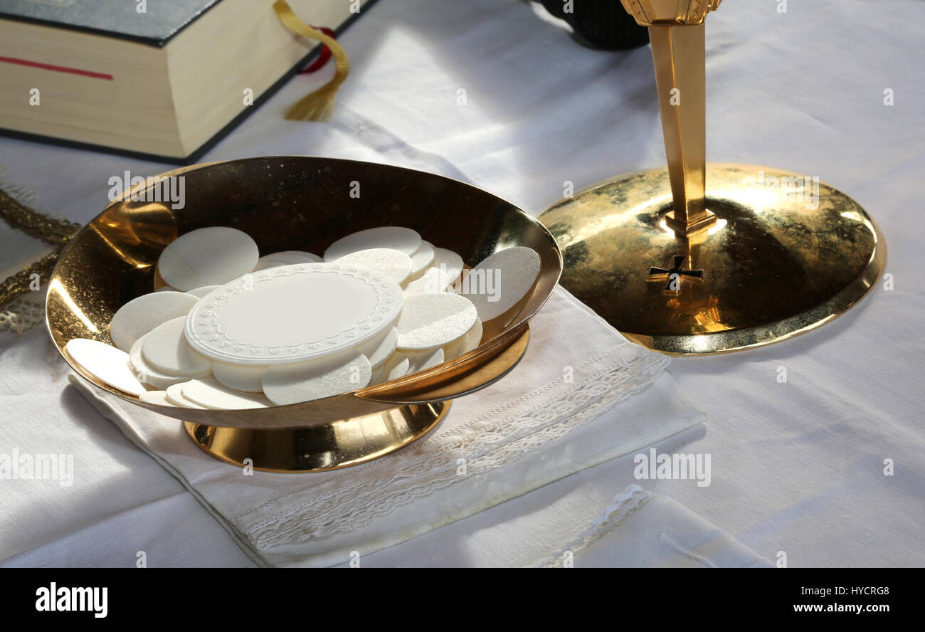 many consecrated Host during the Mass of first communion Stock Photo ...