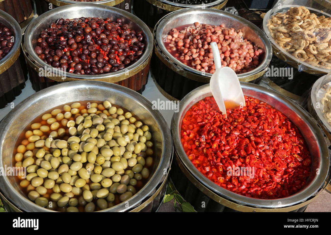 Mediterranean market stall with olives and red peppers for sale Stock ...