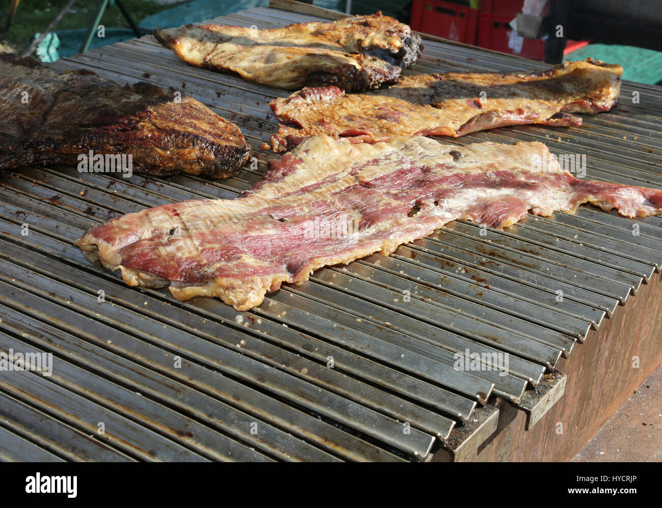 bbq meat in a stall of steert food with bacon and cooked pork Stock ...