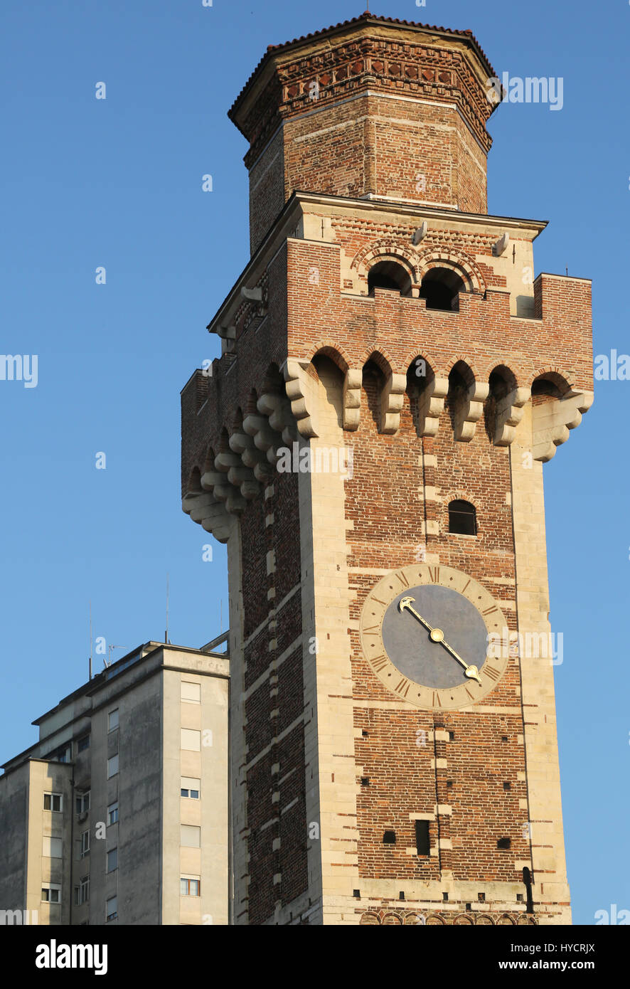 clock tower of an ancient Italian basilica and the largest modern ...