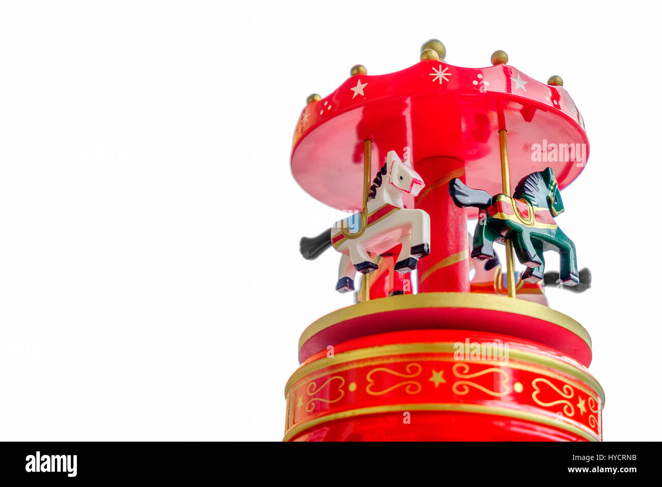 music box red merry go round carousel horses toy closeup white ...