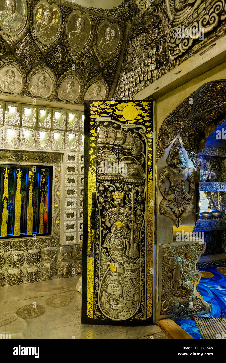 Ornate doors and silver plates inside one of the halls at Wat Sri ...