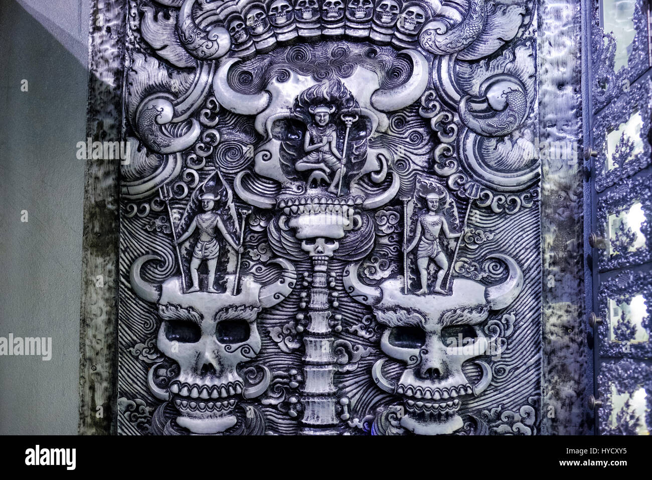 Detail of a carved silver plate inside the main hall at Wat Sri Suphan ...