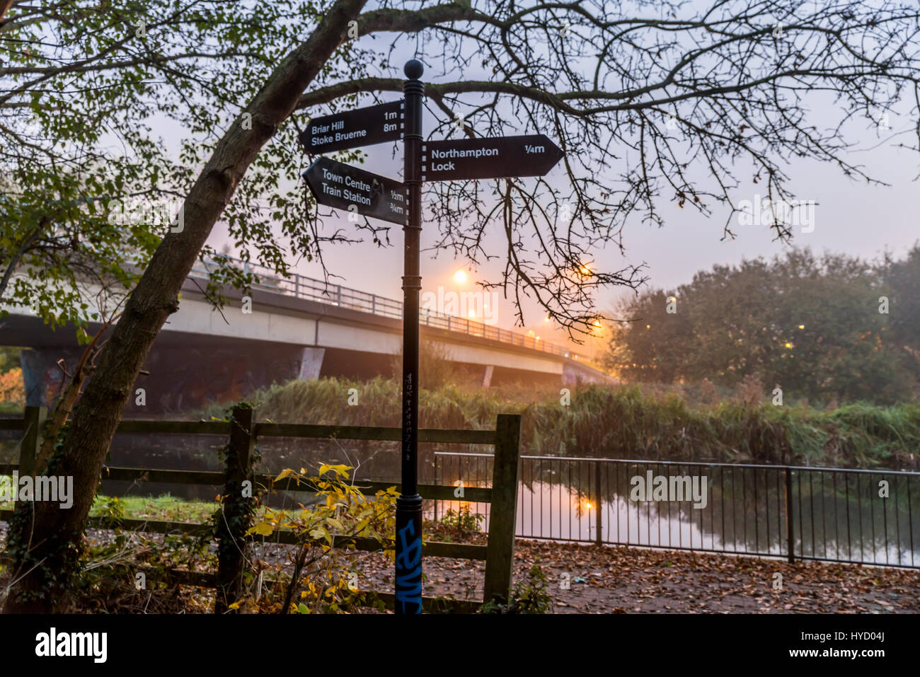 Night view of street directional sign in England Stock Photo - Alamy