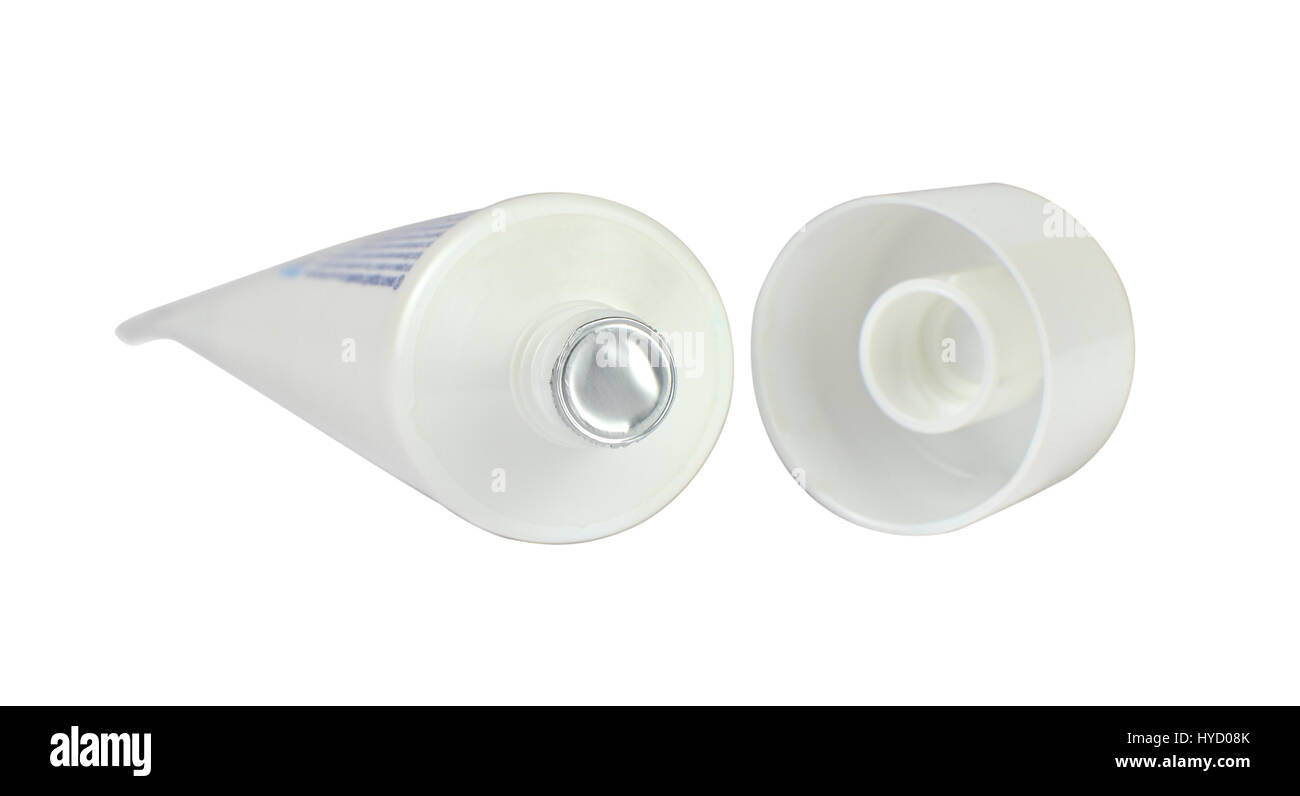 Full newly open tube on a white surface Stock Photo - Alamy