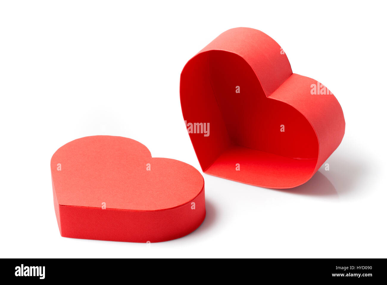 Open empty cardboard gift box with heart shape on white background ...