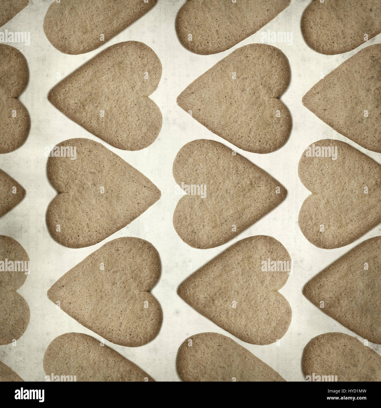 textured old paper background with ginder thin cookie shaped like a ...