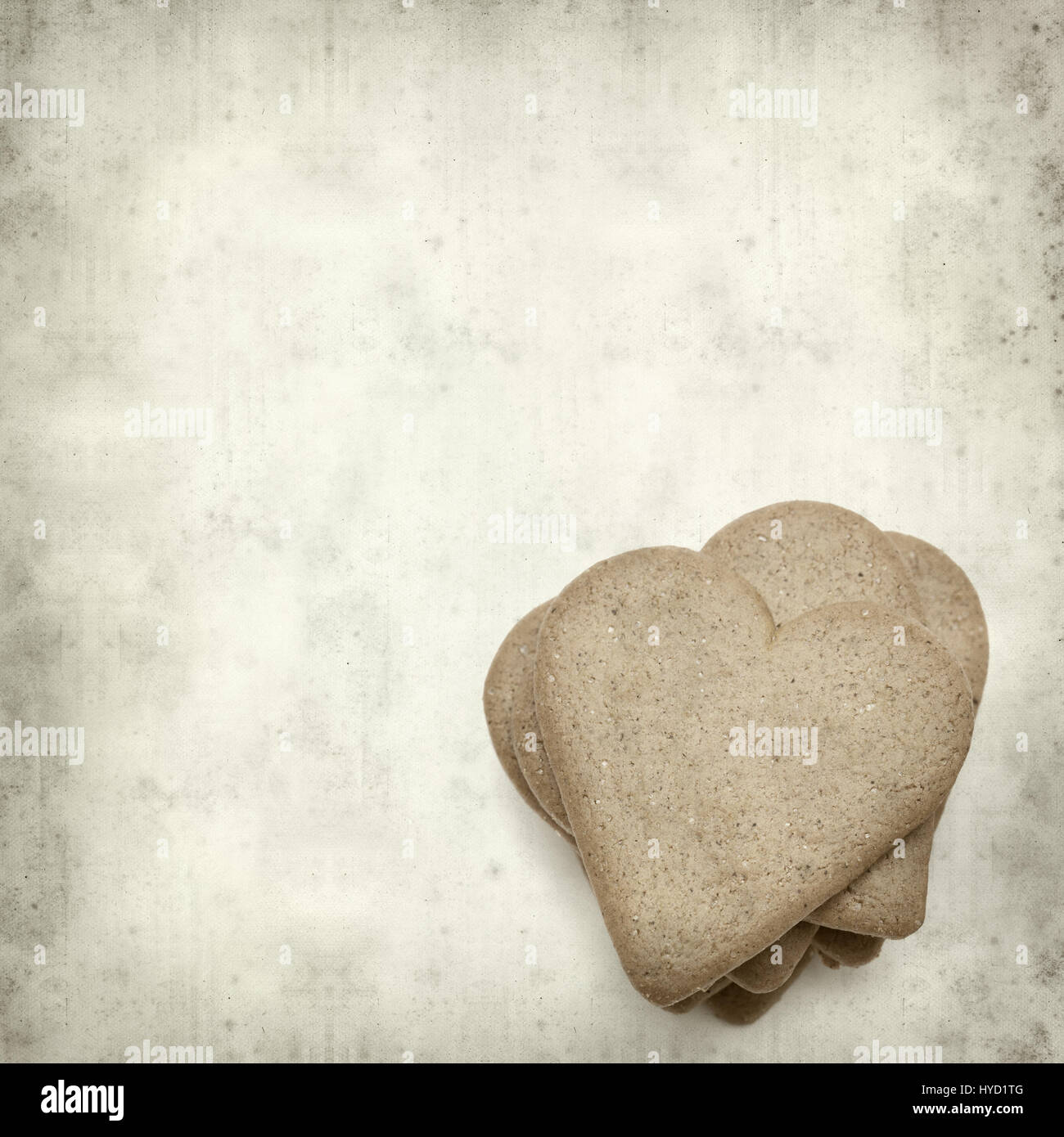textured old paper background with ginder thin cookie shaped like a ...