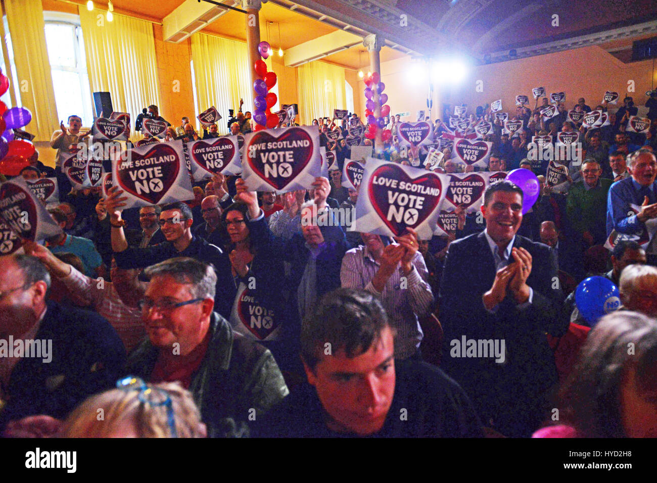 The audience wave placards at a pro-union Better Together campaign ...