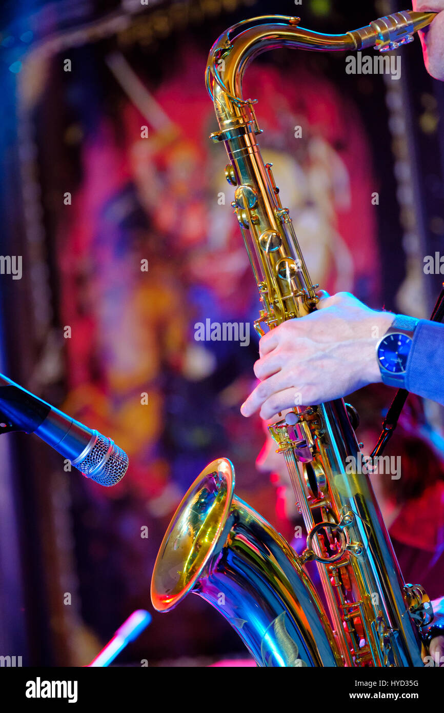 Musician plays the saxophone at the stage Stock Photo - Alamy