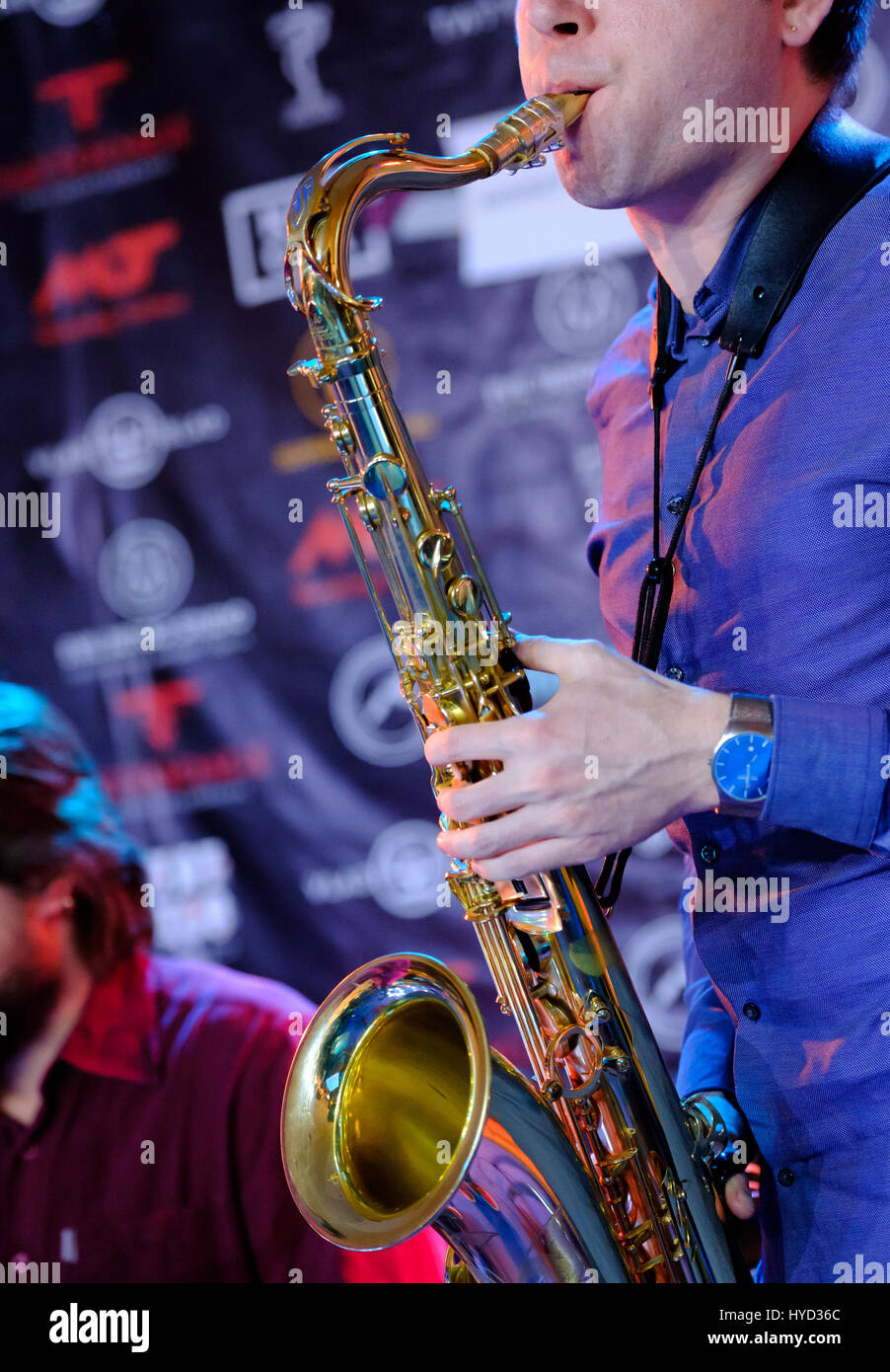 Musician plays the saxophone at the stage Stock Photo - Alamy