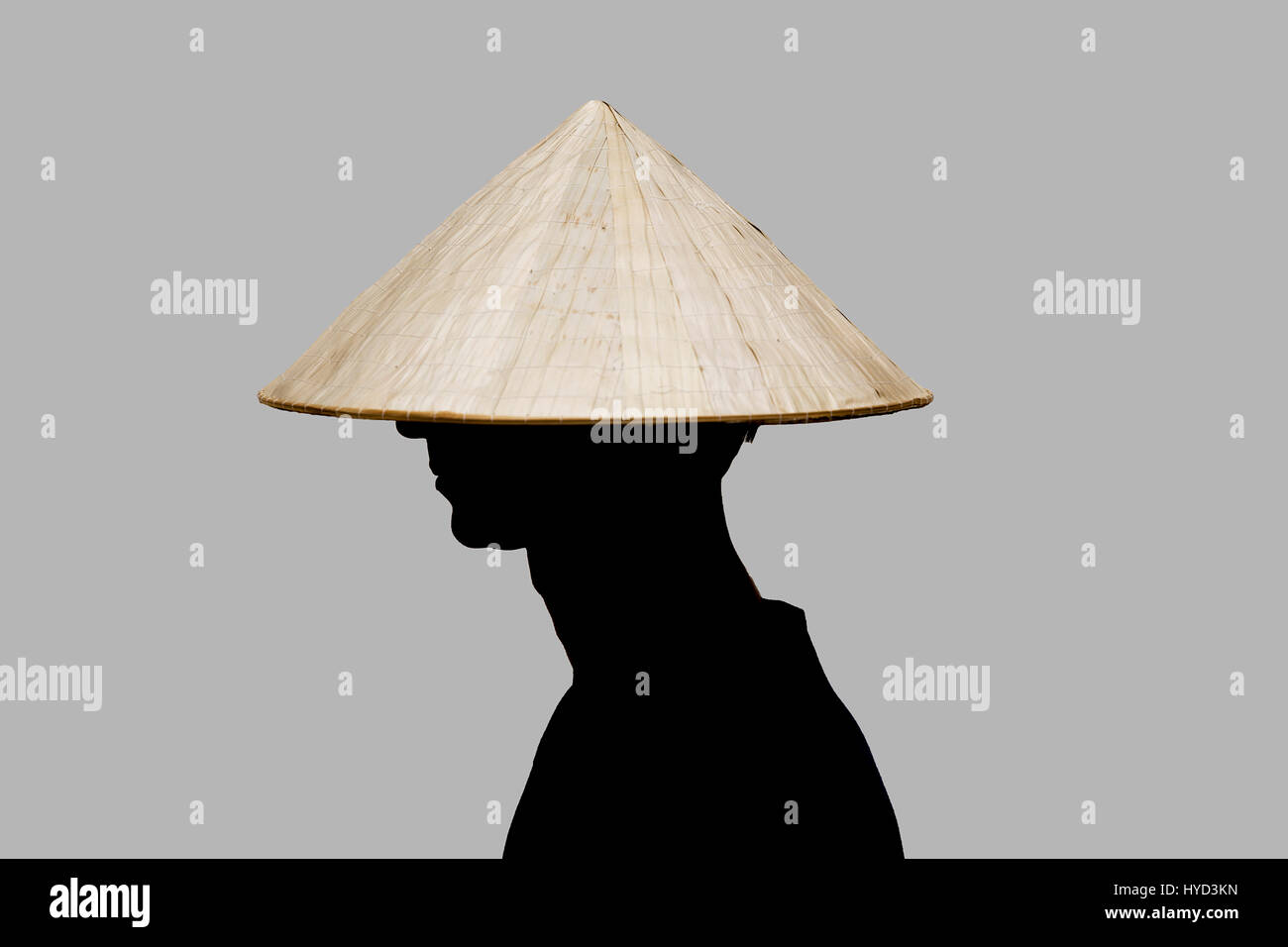 Man with traditional hat from Asia made of wicker Stock Photo - Alamy
