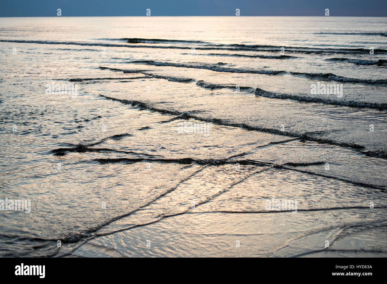 sea with waves before sunset Stock Photo - Alamy