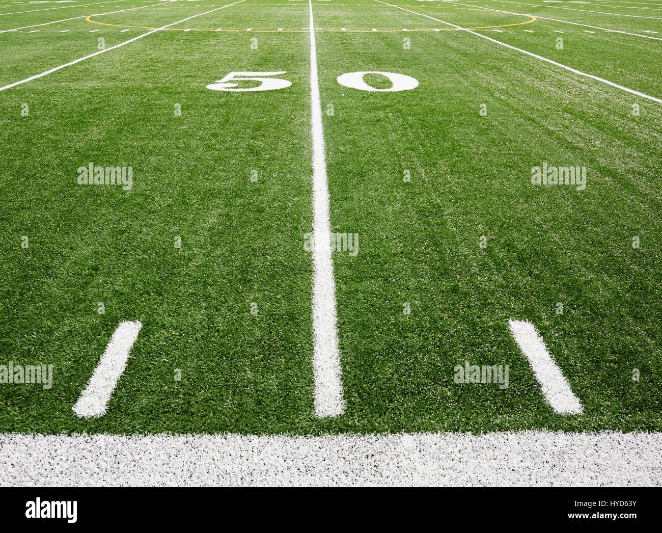 Football field marking of 50 yard line Stock Photo - Alamy