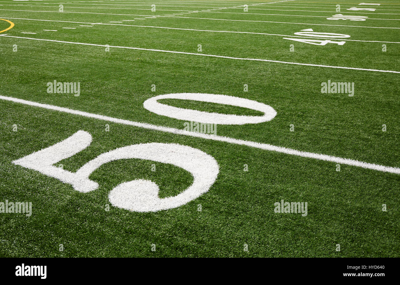 Football field marking of 50 yard line Stock Photo - Alamy