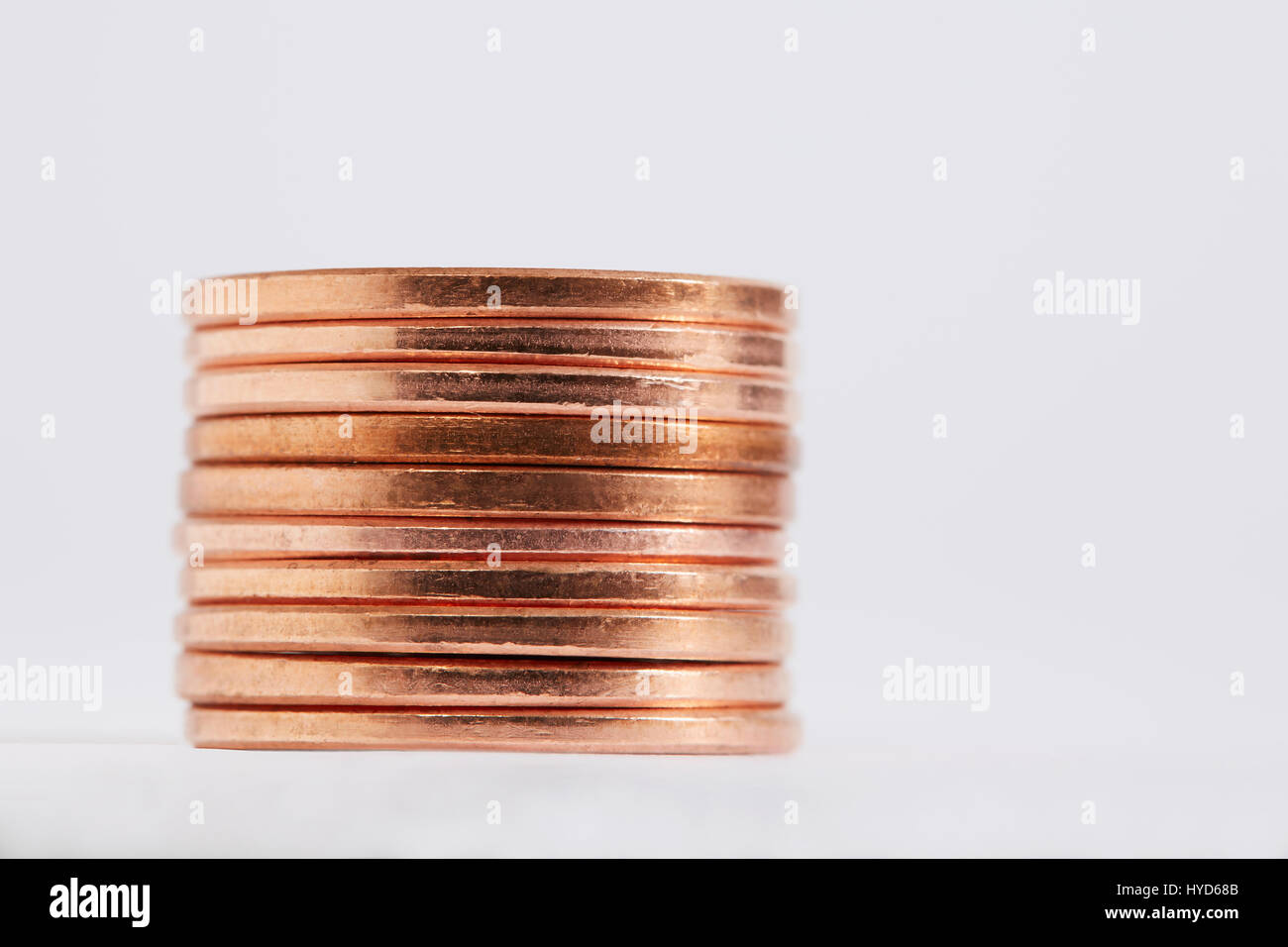 Stack of coins on white background Stock Photo - Alamy