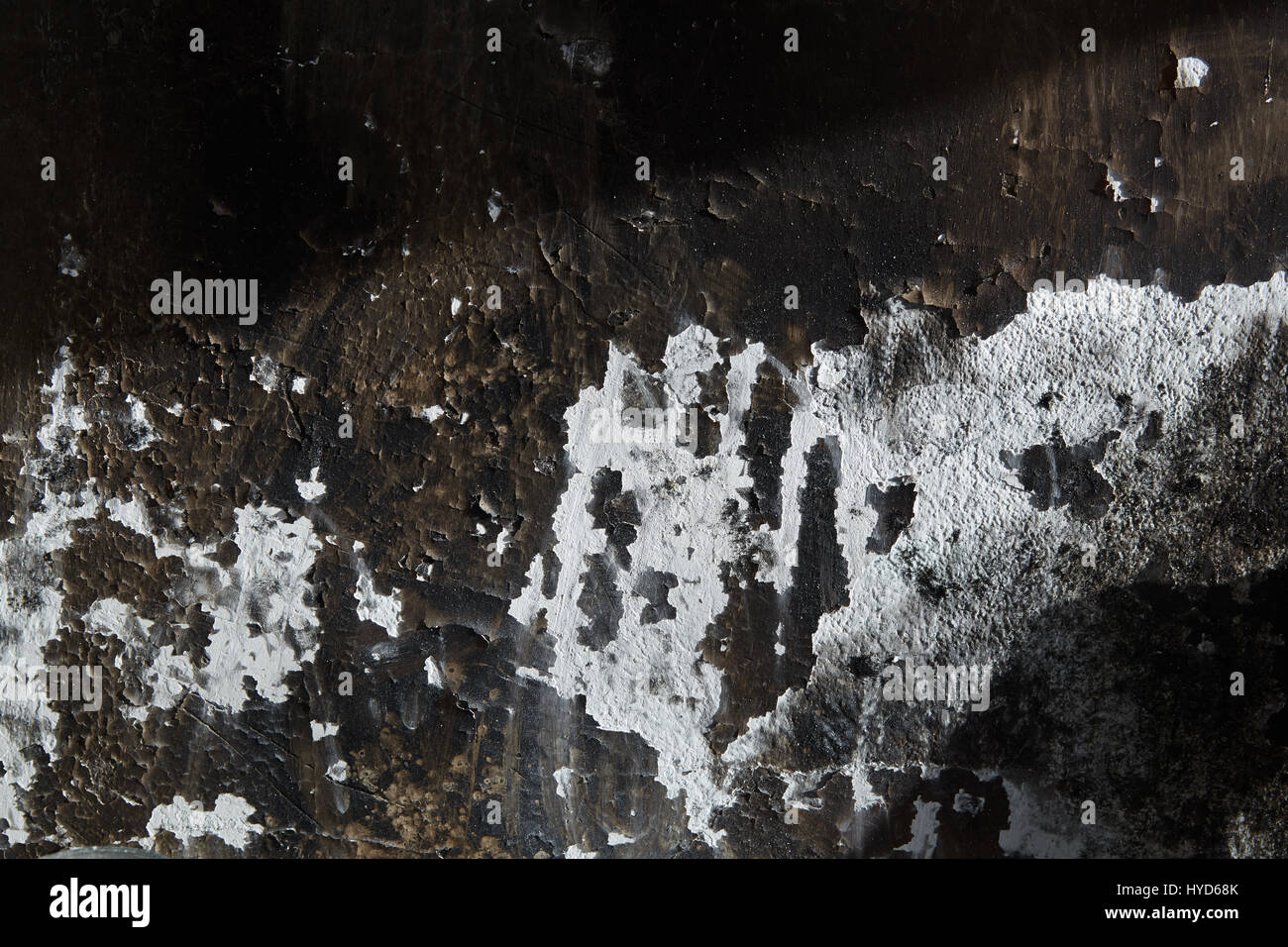Old burned wall. Horizontal close-up photo Stock Photo - Alamy