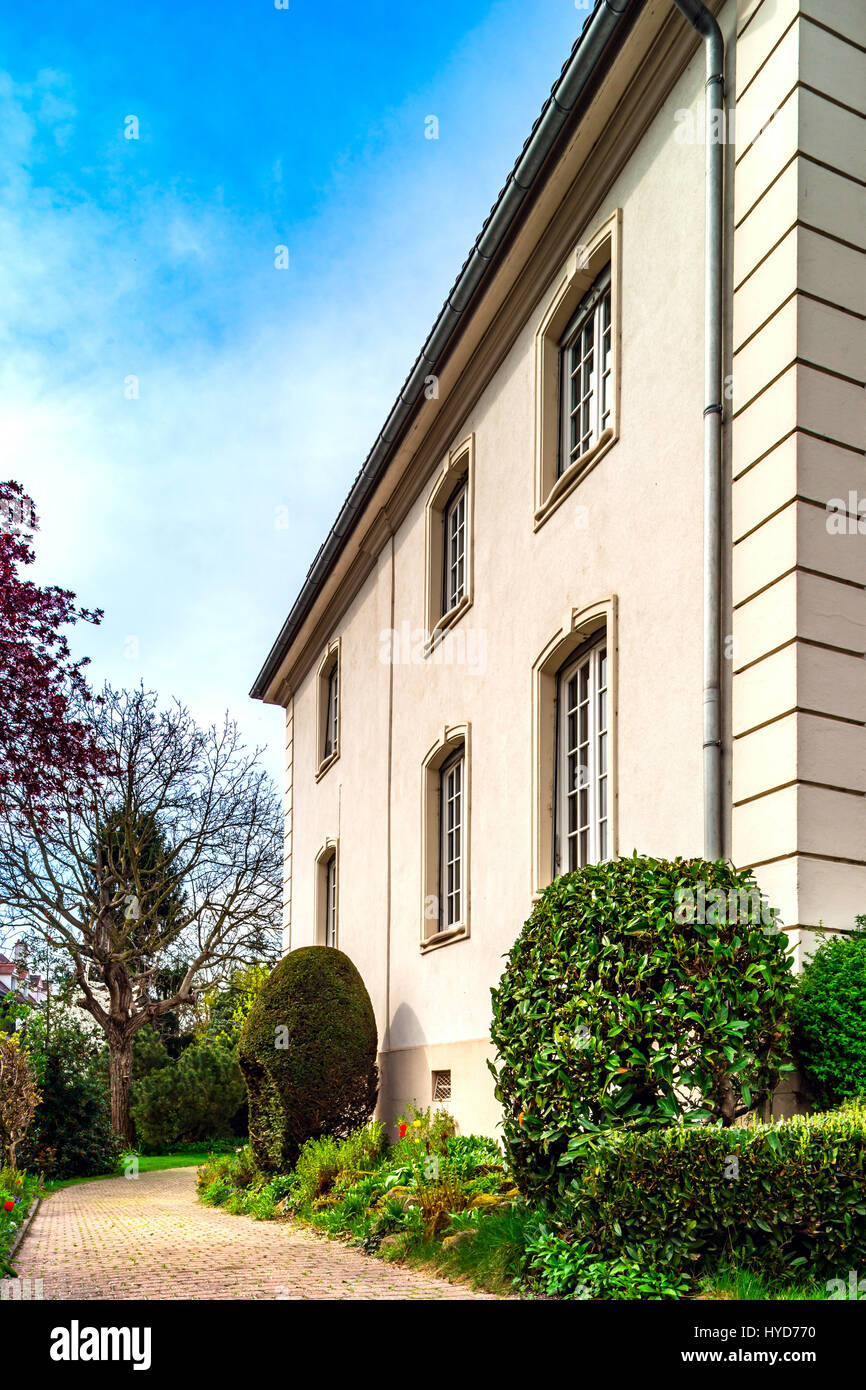 Classic french house in residential district of Strasbourg, blossom ...