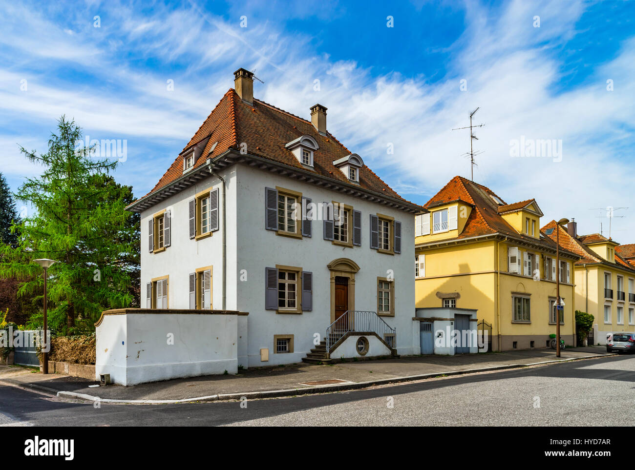 Classic french house in residential district of Strasbourg, blossom ...