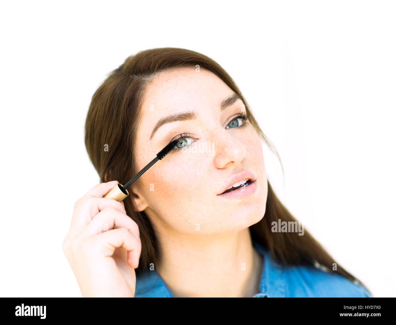 Woman applying up holding hi-res stock photography and images - Alamy