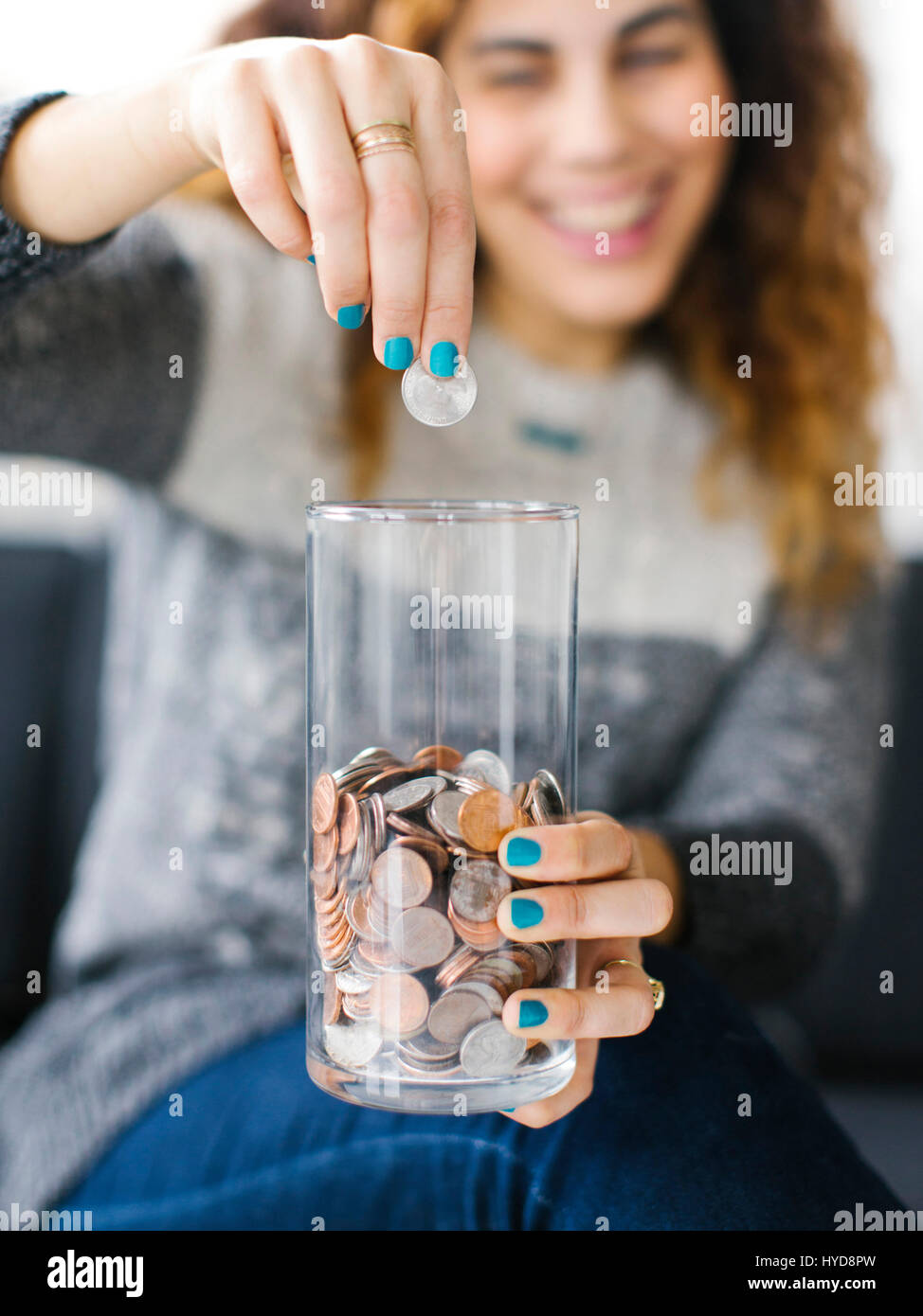 Woman sitting on money hi-res stock photography and images - Alamy