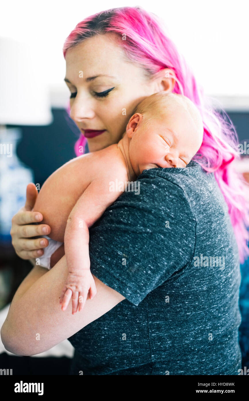 Mother holding newborn son (2-5 months Stock Photo - Alamy