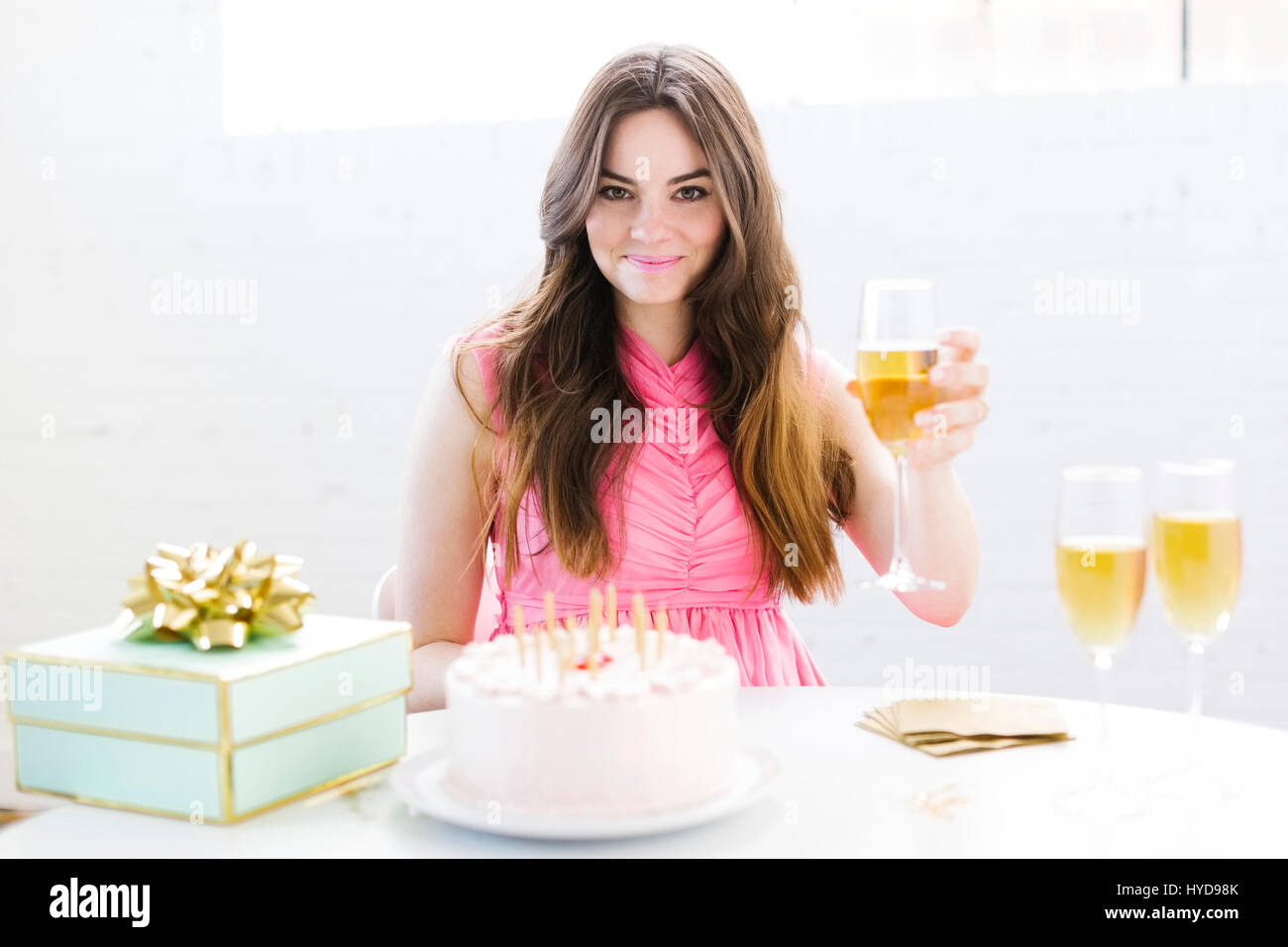 Portrait of woman at birthday party Stock Photo - Alamy
