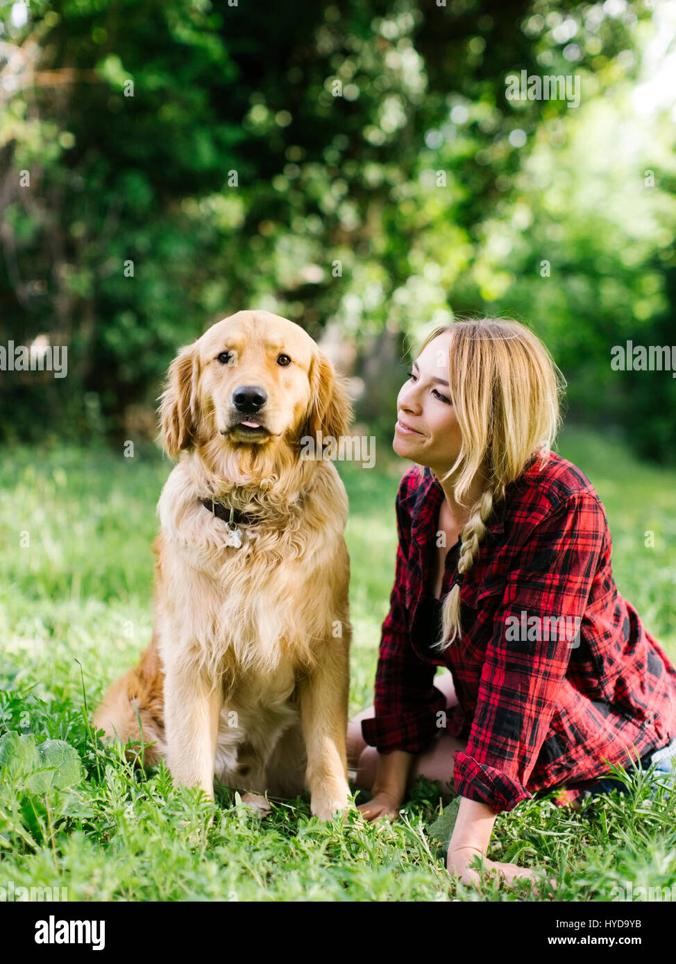 Portrait of woman with dog in nature Stock Photo - Alamy
