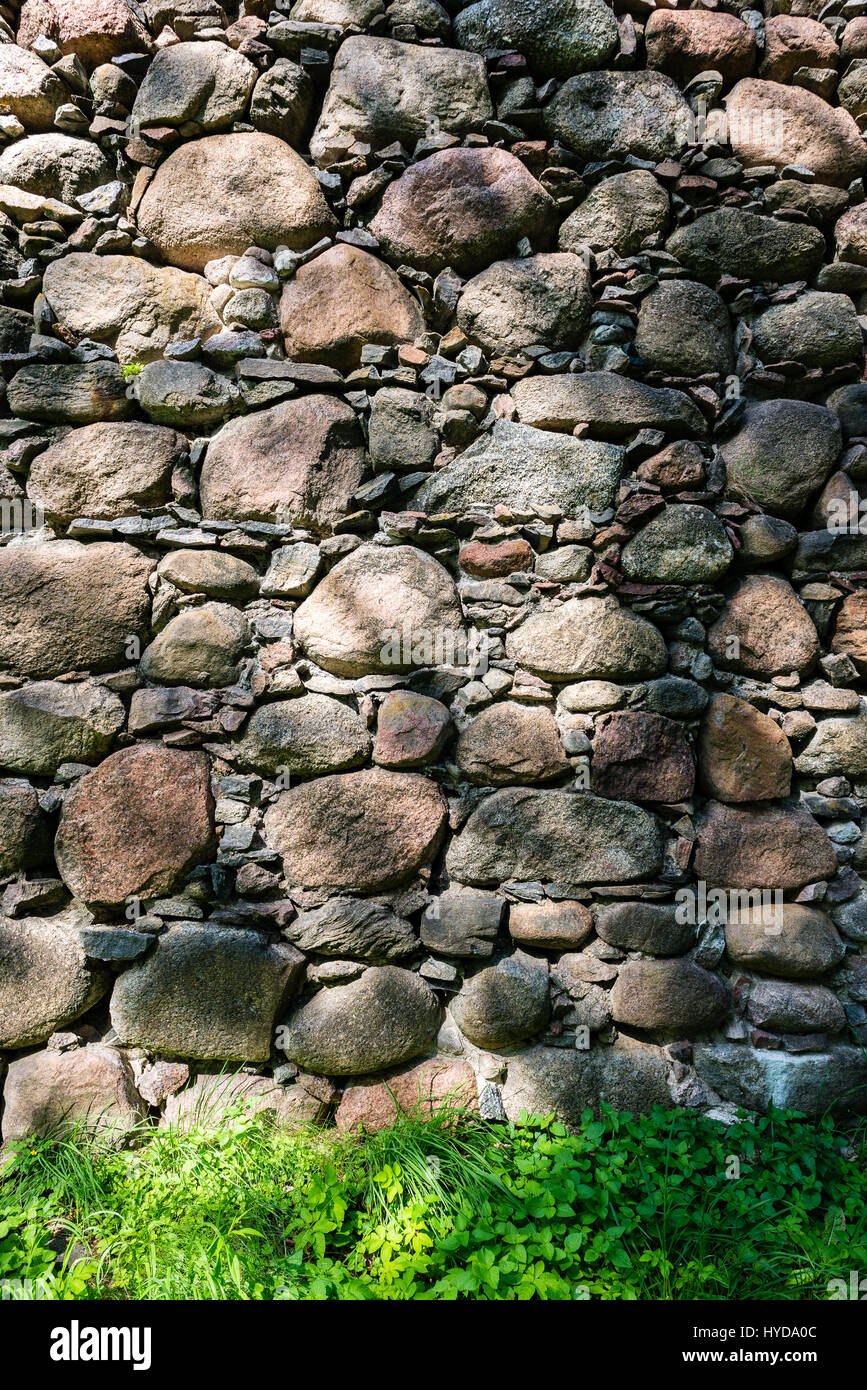 ancient stone brick wall background texture with green grass Stock ...