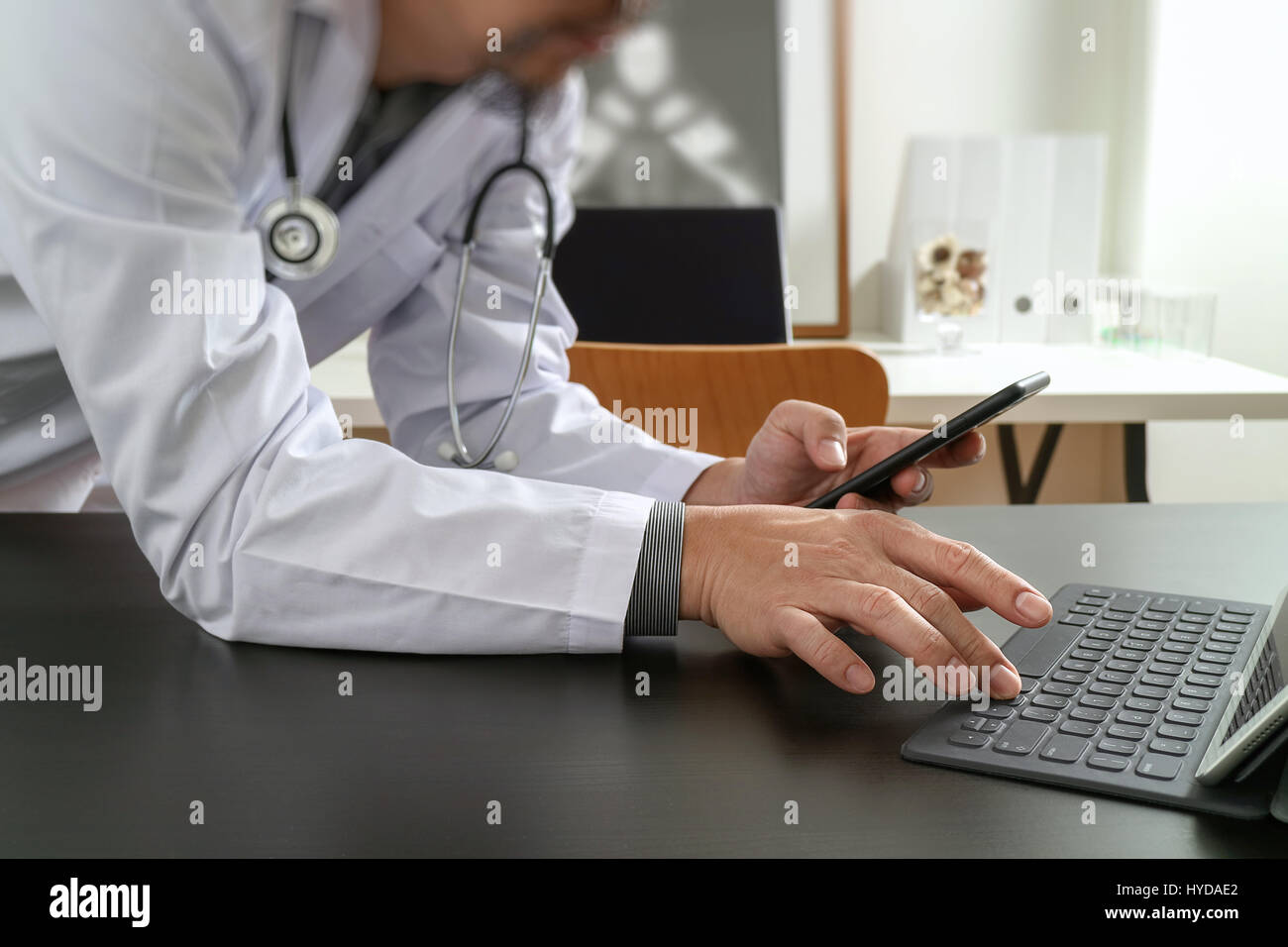 Medical technology concept. Doctor working with smart phone and ...