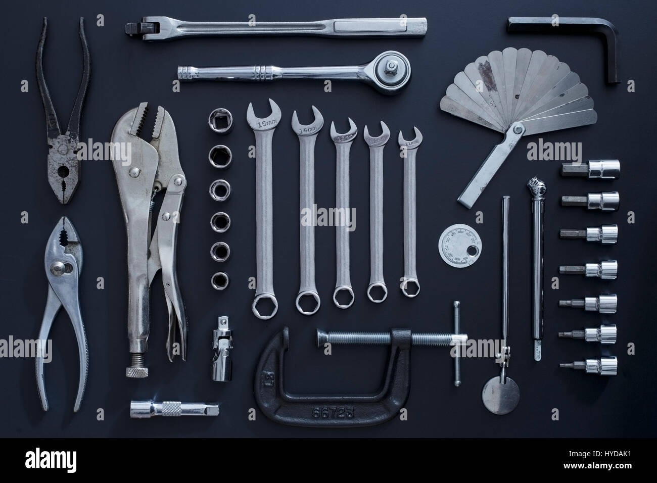 Studio shot of work tools on black background Stock Photo - Alamy