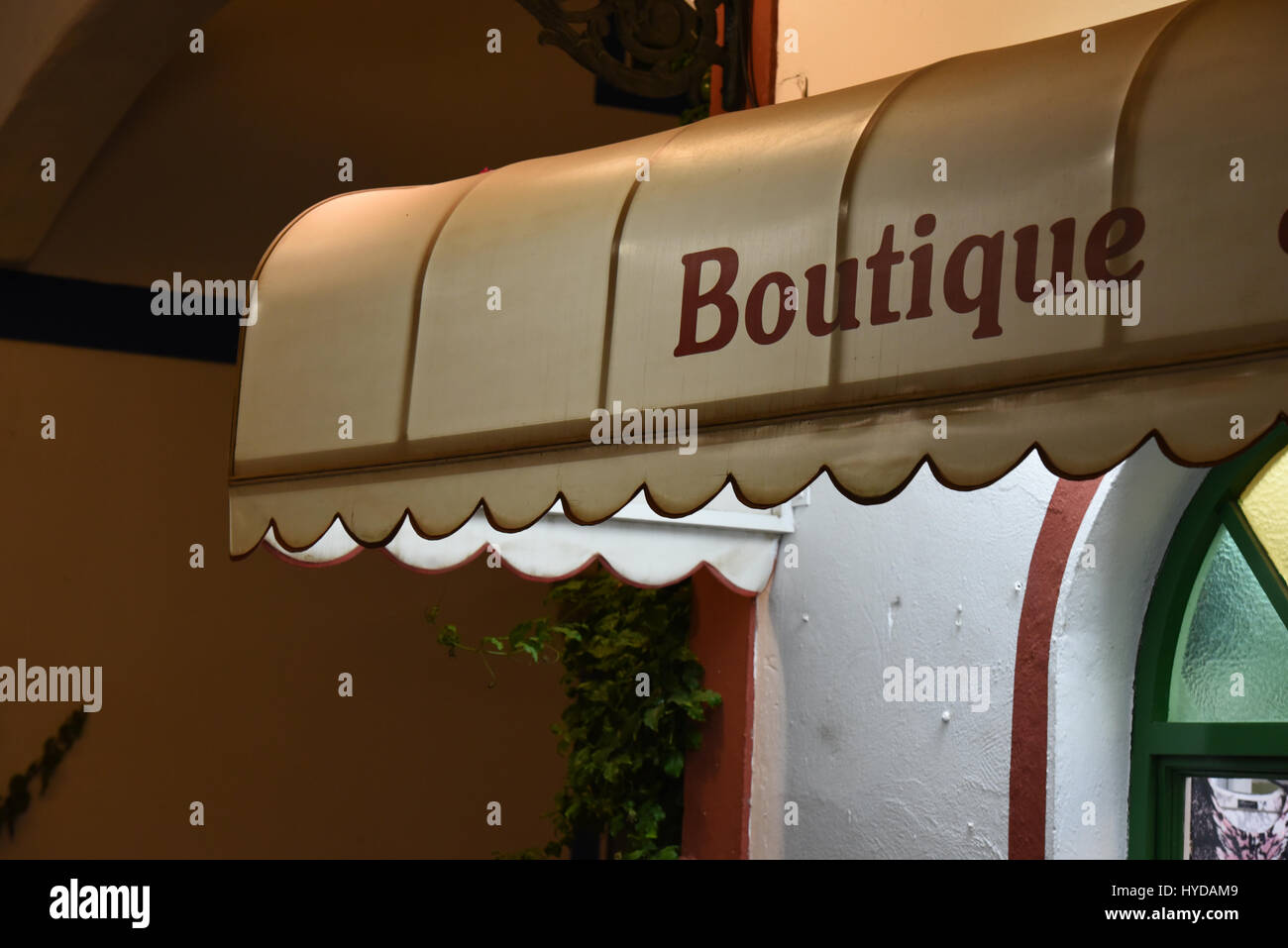 Boutique text decoration on a small shop Stock Photo - Alamy