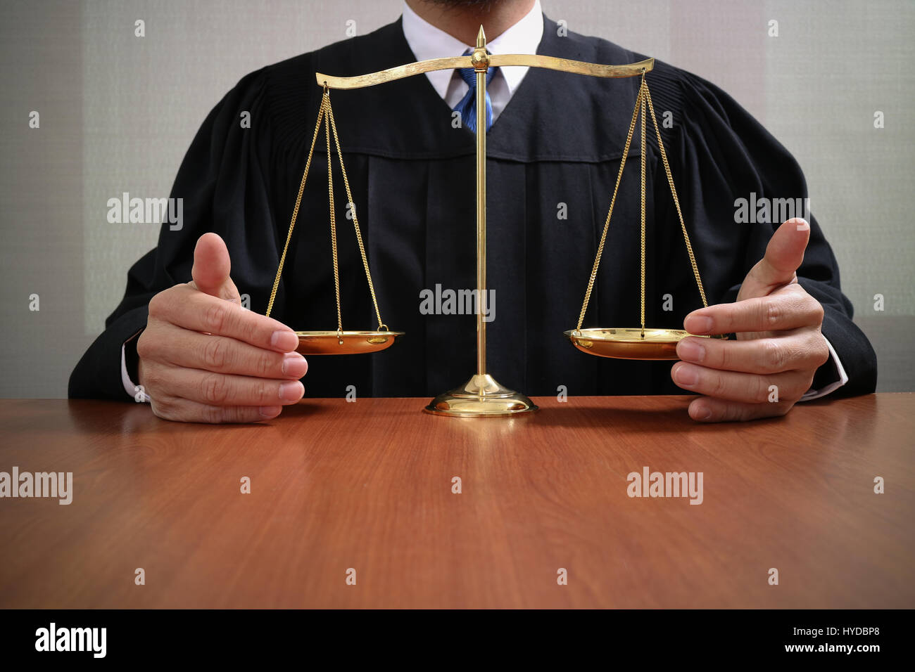justice and law concept.Male judge in a courtroom with the balance ...