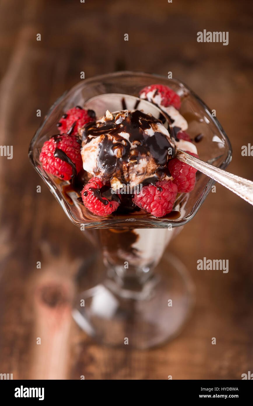 Raspberry topping sauce ice cream hi-res stock photography and images ...