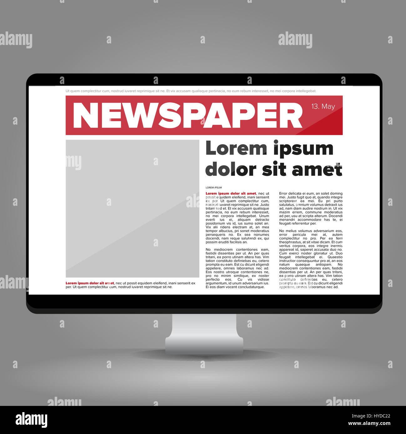 Newspaper on screen computer Stock Photo - Alamy