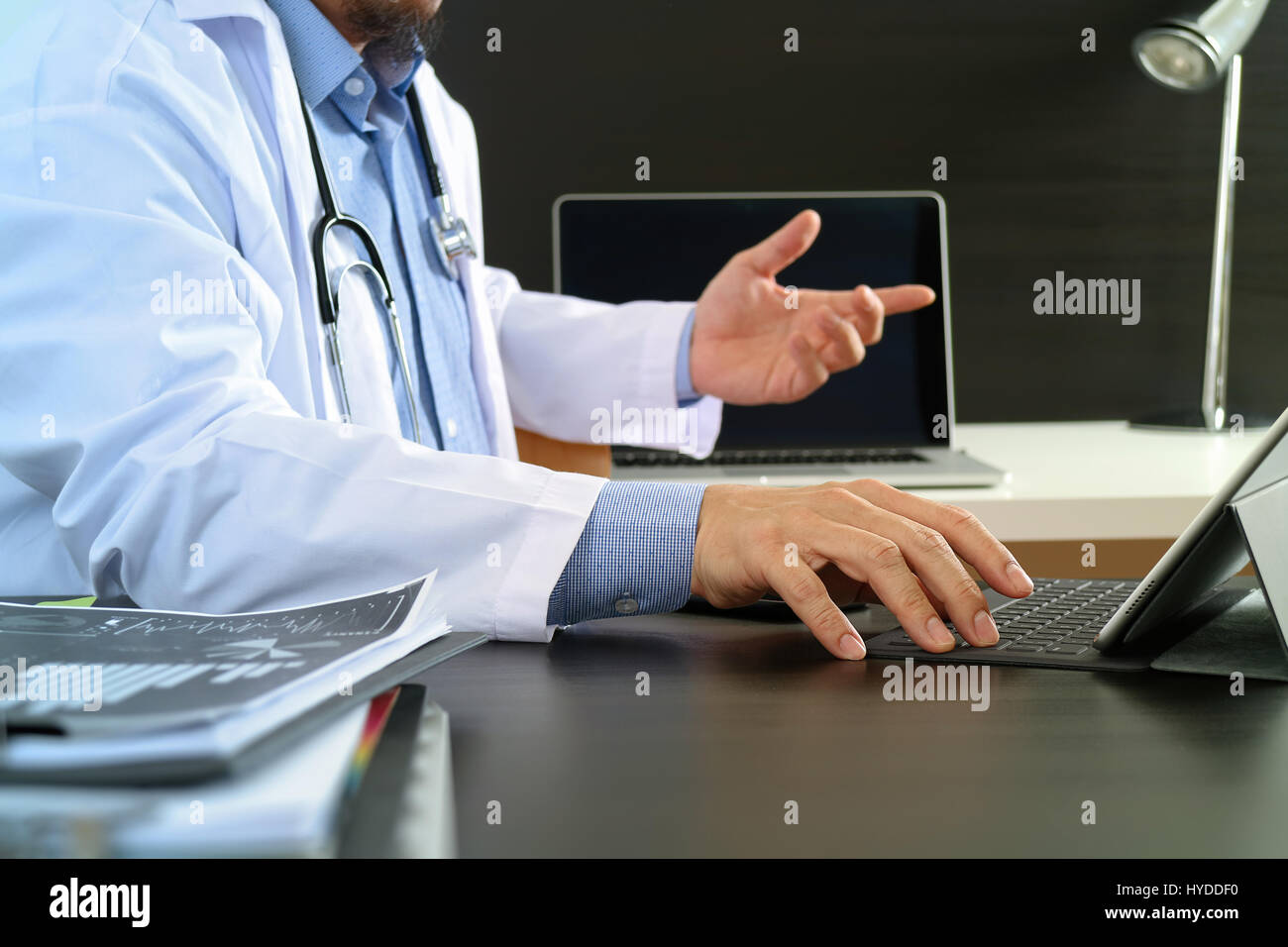Medical technology concept. Doctor working with smart phone and ...