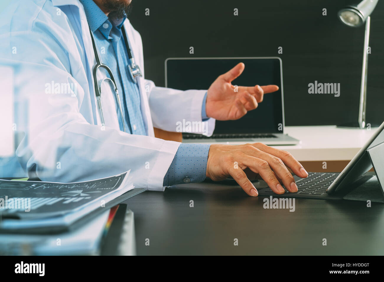 Medical technology concept. Doctor working with smart phone and ...