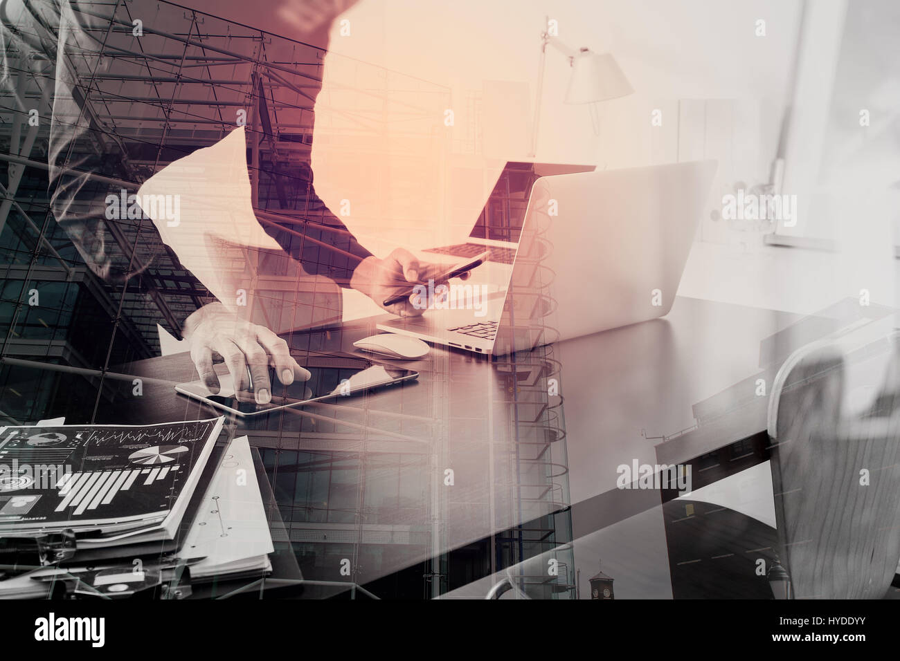 businessman or Designer using smart phone with latop and digital tablet ...