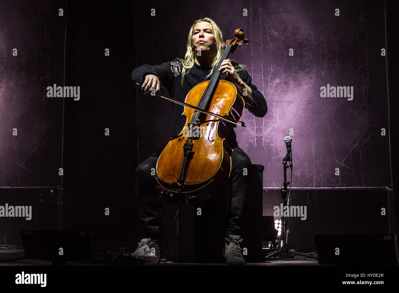 Finnish band Apocalyptica playing Metallica songs live in concert hall ...