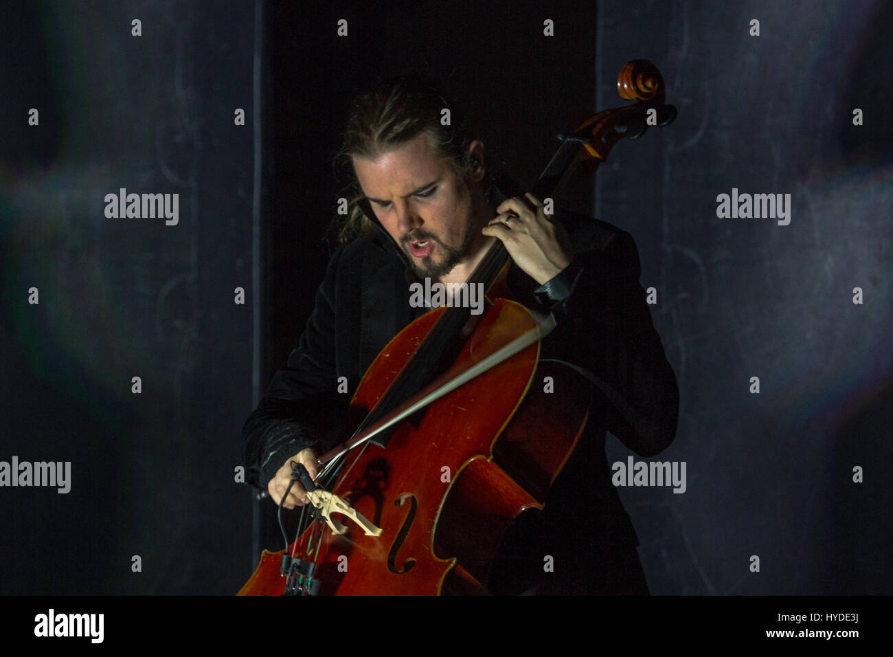 Finnish band Apocalyptica playing Metallica songs live in concert hall ...