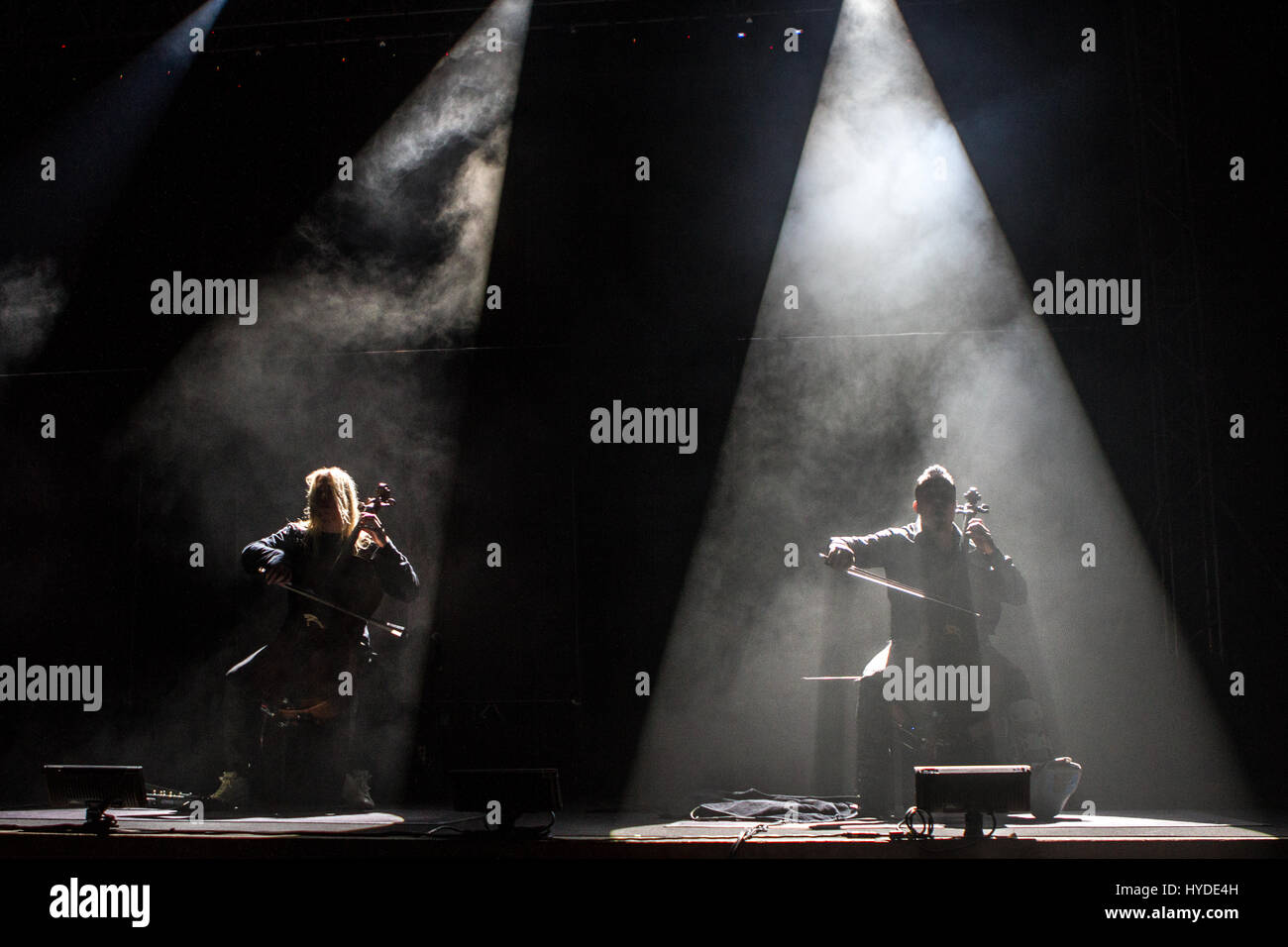 Finnish band Apocalyptica playing Metallica songs live in concert hall ...