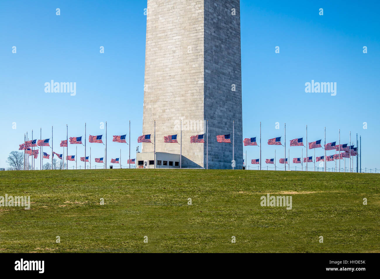 American flags at the base of the washington monument hi-res stock ...