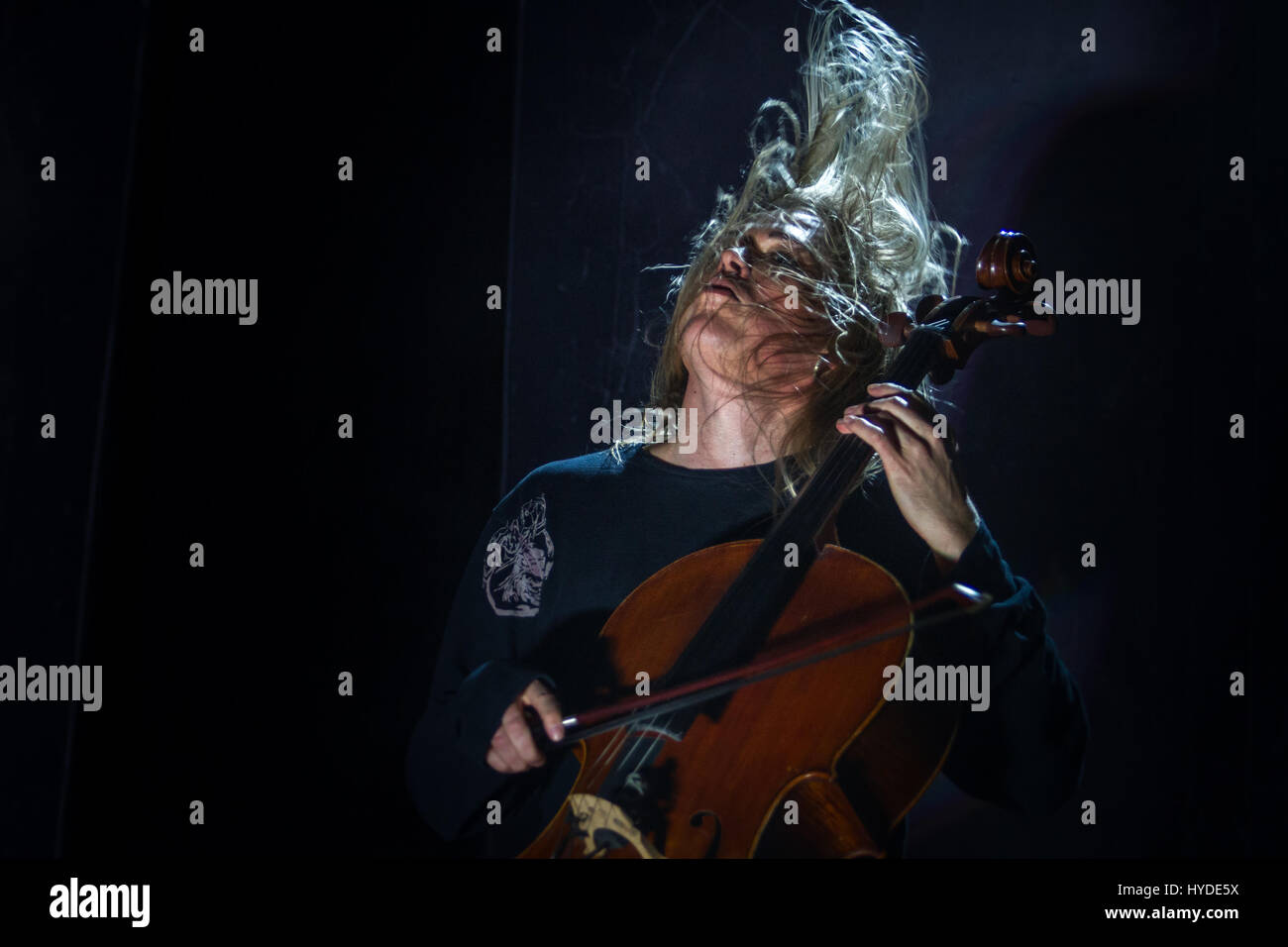 Finnish band Apocalyptica playing Metallica songs live in concert hall ...